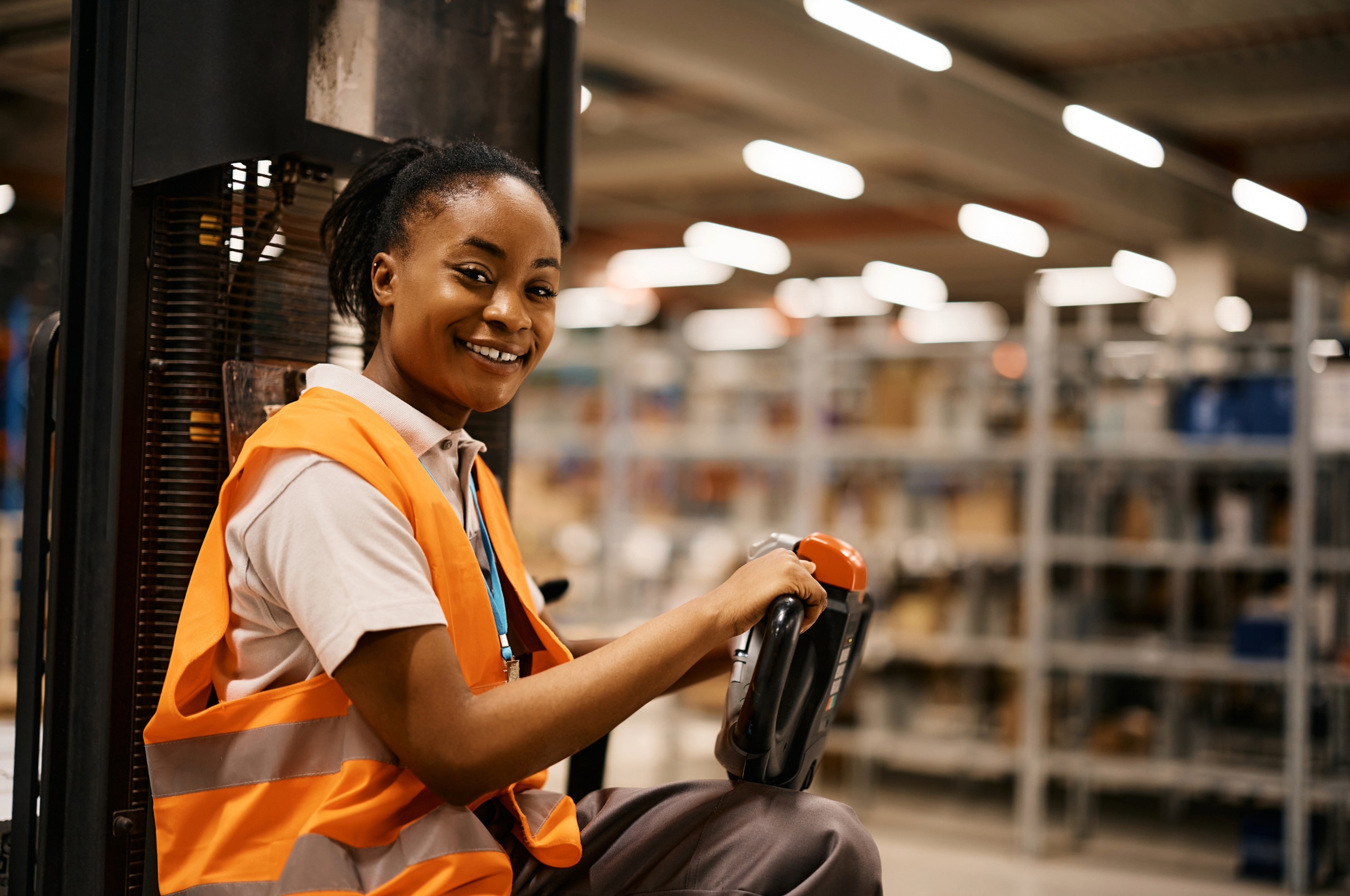 Female forklift driver – The AIDS Taskforce of Greater Cleveland
